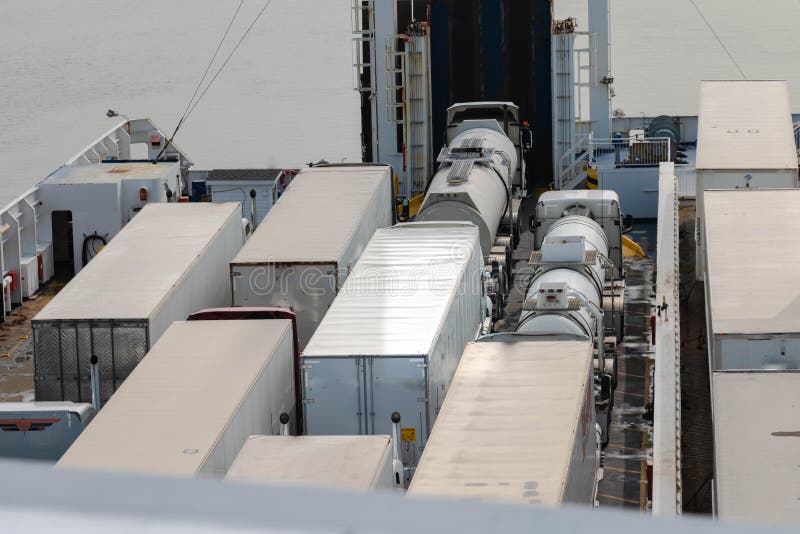 Trucks Loaded into Ferry for Transportation Stock Image - Image of ...