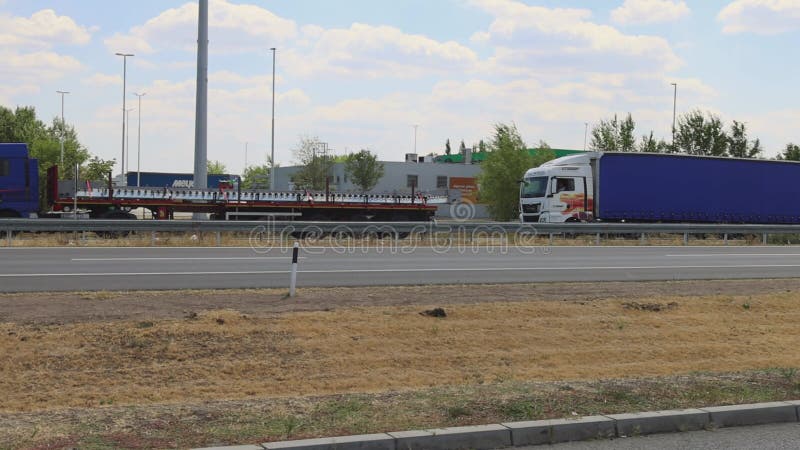 Trucks Queue at Border stock video. Video of entrance - 293485083