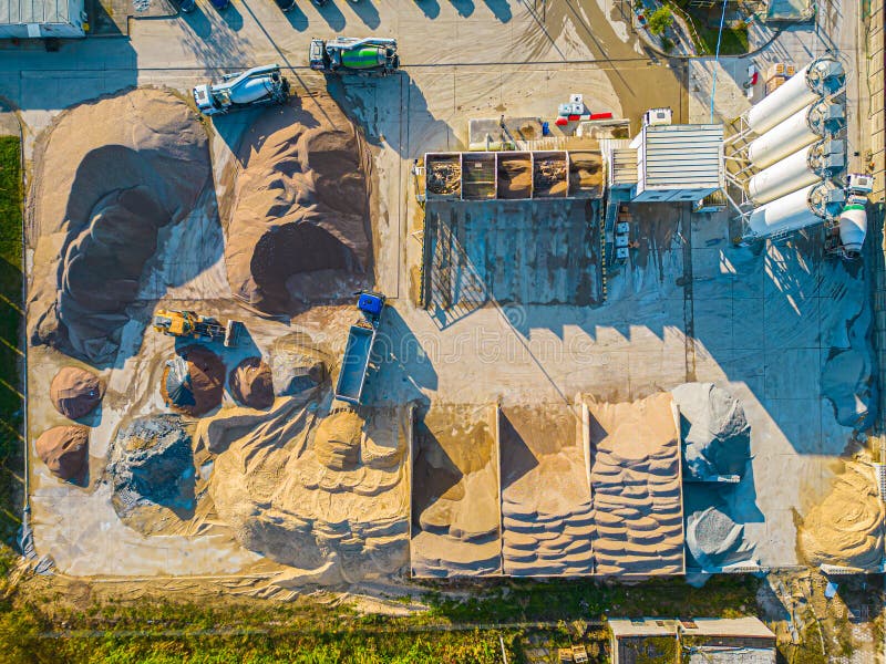 Trucks and Tippers Parked at Open Pit Sand Mining. Aerial View of ...