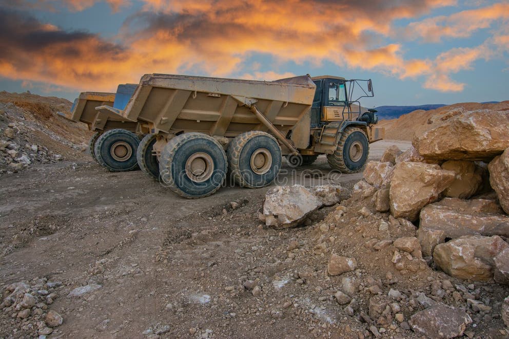 Trucks for Transporting Rock in a Construction Stock Photo - Image of ...