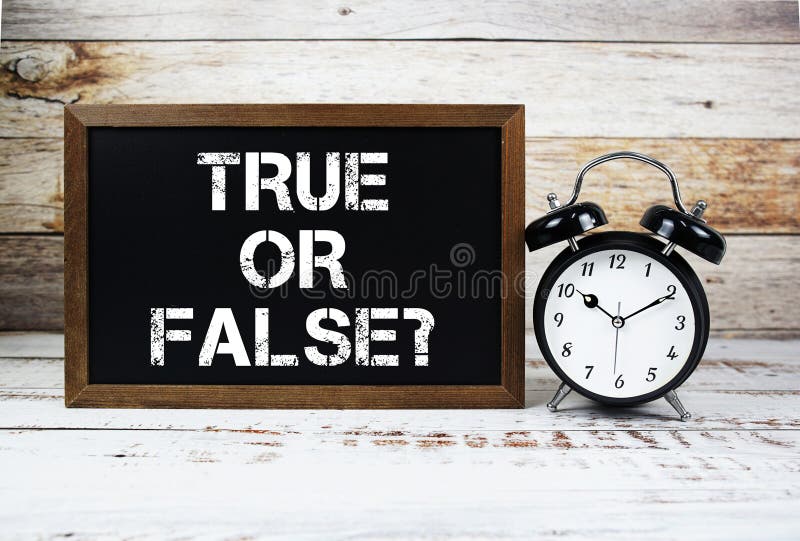 True False Text Message Alarm Clock Wooden Background Stock Photos ...