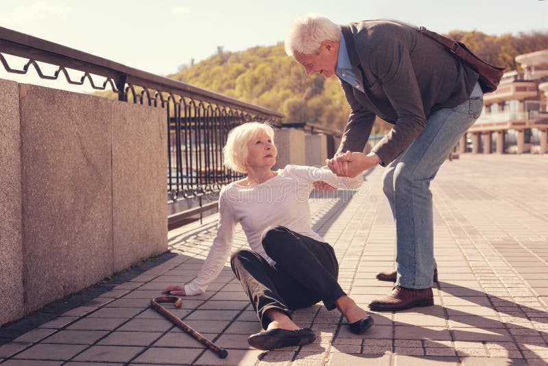 Polite Elderly Man Helping A Woman To Get Up Stock Image Image Of Couple Health 102150677