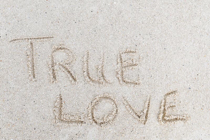 True Love Message Sign in Sand Stock Photo - Image of sign, surface ...