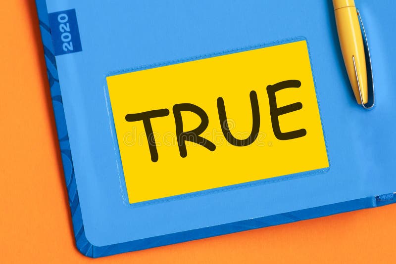 Word TRUE is Written on Wooden Cubes on a Bright Yellow Surface ...