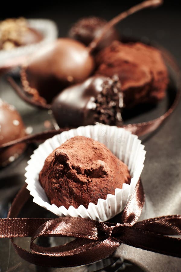 The Dark Chocolate Truffles on the Blue and White Dish Stock Photo ...