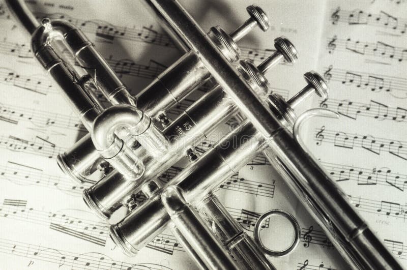 Trumpet Lying on Note Sheet Stock Photo - Image of note, creation ...