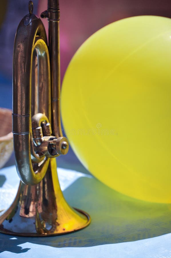 Trumpet with yellow ball stock photo. Image of style - 100140110