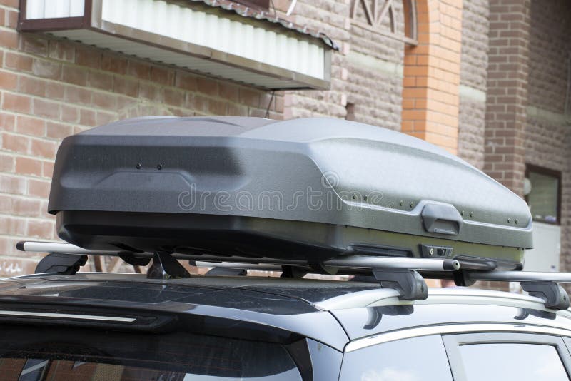 The Trunk on the Roof of a Passenger Car. Cargo Transportation Stock ...