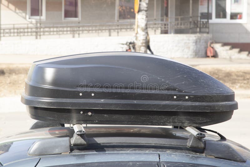 The Trunk on the Roof of a Passenger Car.Shipping by Car Stock Image ...