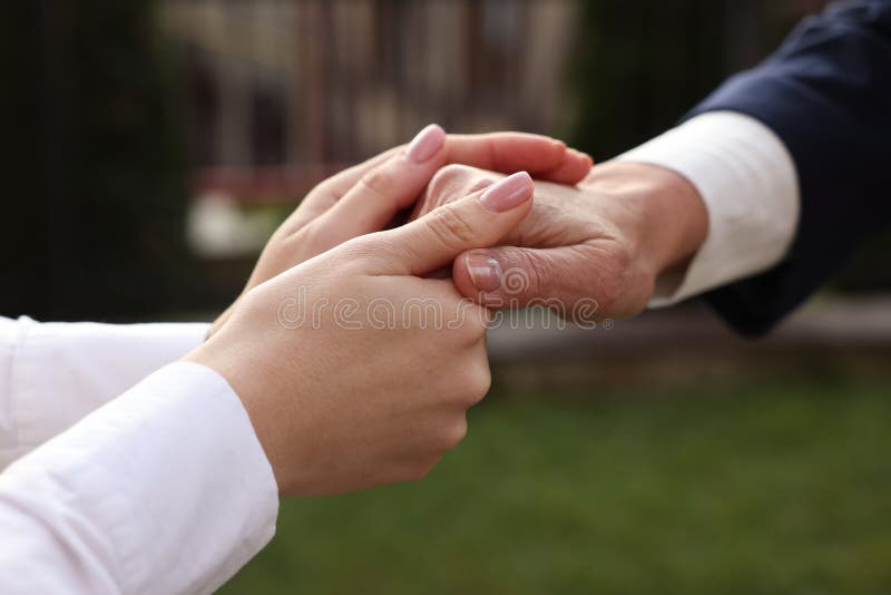 Trust and Deal. Partners Joining Hands Outdoors, Closeup Stock Image ...