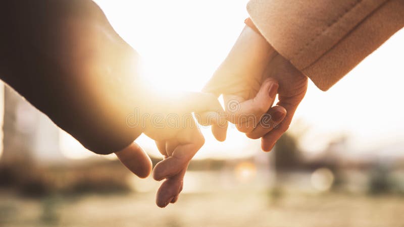 Closeup Image of Two Lovers Holding Hands at Sunset Stock Image - Image ...