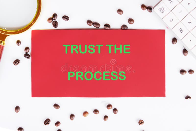 TRUST Process, Business Concept. TRUST the PROCESS Words Written on Red Paper on a Work Surface ...