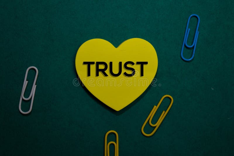 Trust Write on a Sticky Note Isolated on Office Desk Stock Photo ...