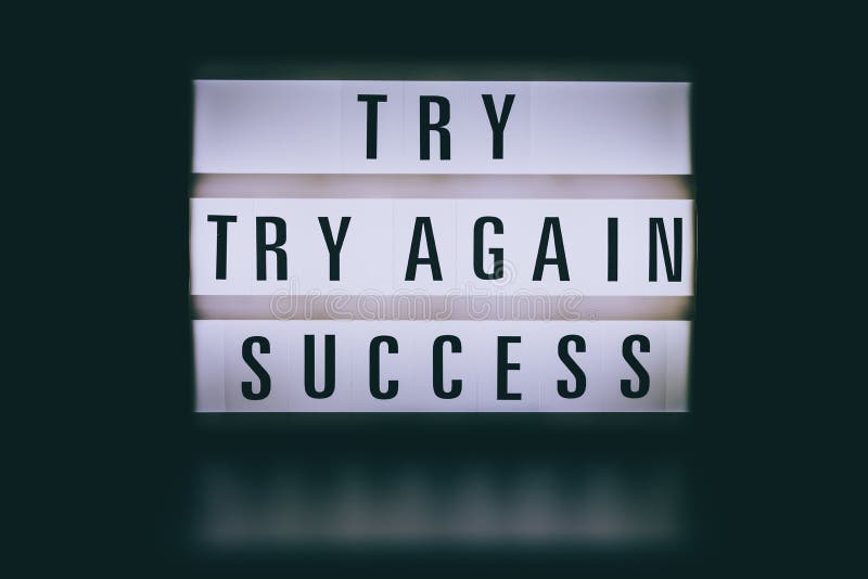 Try Try Again Success Message on Lightbox in the Dark Stock Photo ...