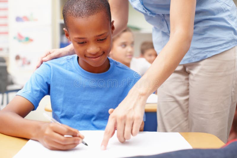 Try this Question Next...a Female Teacher Helping a Student with His ...