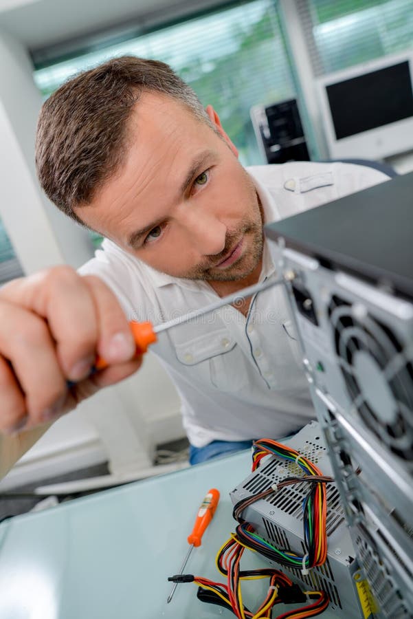 Trying To Fix Broken Device Stock Photo - Image of cooler, electronic ...