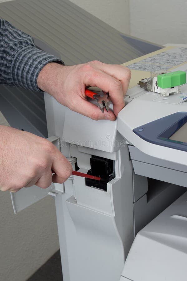 Trying To Repair the Office Printer at Work Stock Photo - Image of ...
