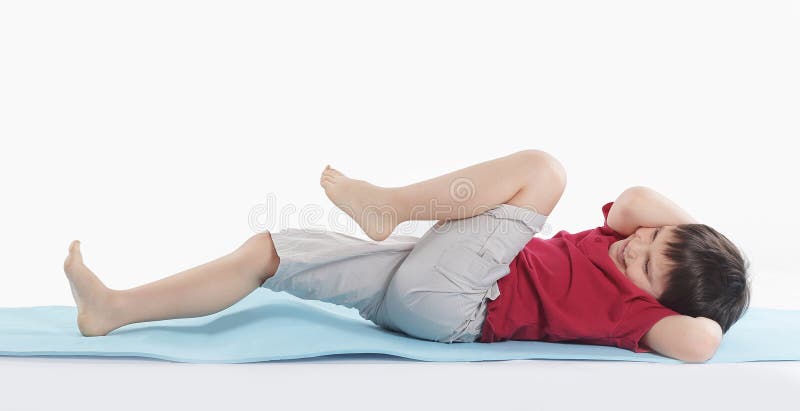 Little Boy Performs an Exercise for the Press.isolated on White Stock ...
