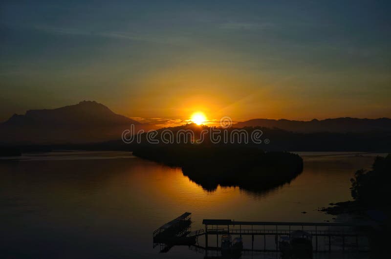 Sunrise stock photo. Image of tuaran, river, bridge - 112403456