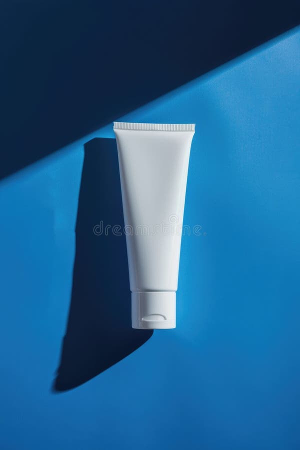 A Tube of Toothpaste on a Blue Background, Suitable for Dental and ...