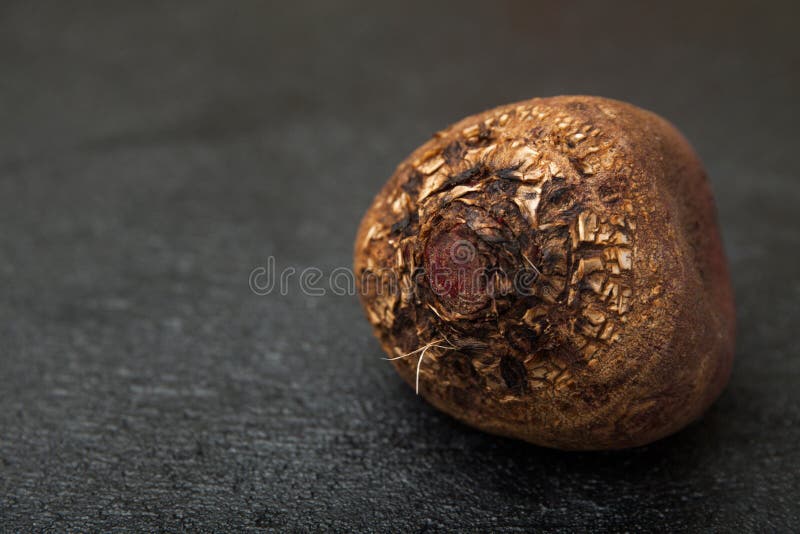 Tuber of Red Beet on a Black Background, Empty Space for Text Stock ...