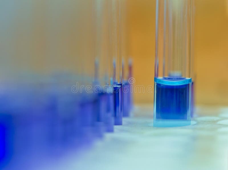 Tubes with Blue Liquid on Test Tube Rack Stock Image - Image of ...