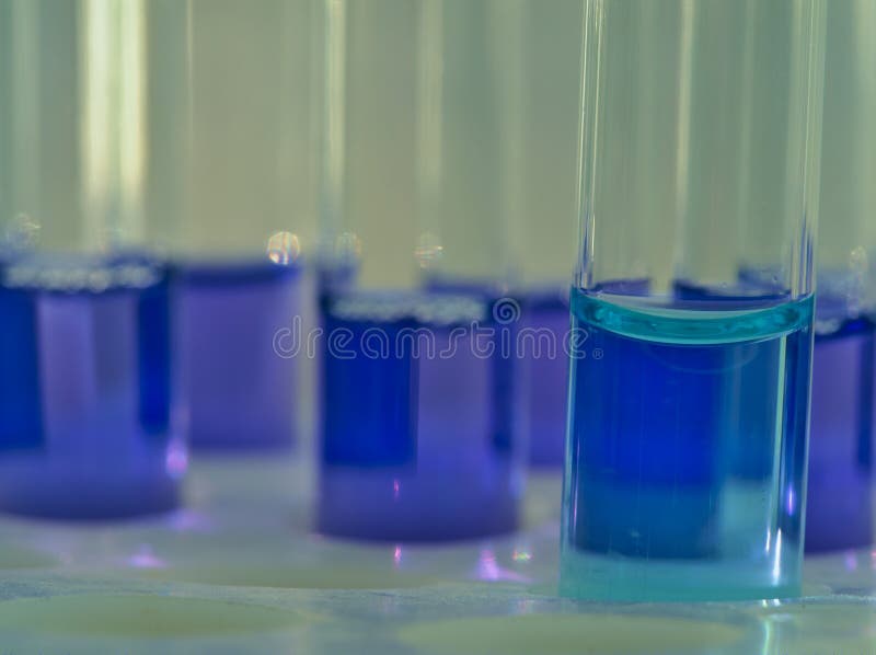 Tubes with Blue Liquid on Test Tube Rack. Stock Image - Image of ...