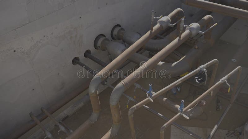 Tubes Conducting Technical Water Connected To Sewer in Pit Stock ...