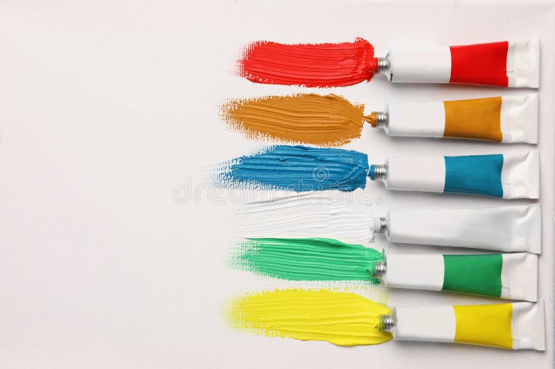 Tubes with Oil Paints and Strokes on White Canvas, Flat Lay. Space for ...