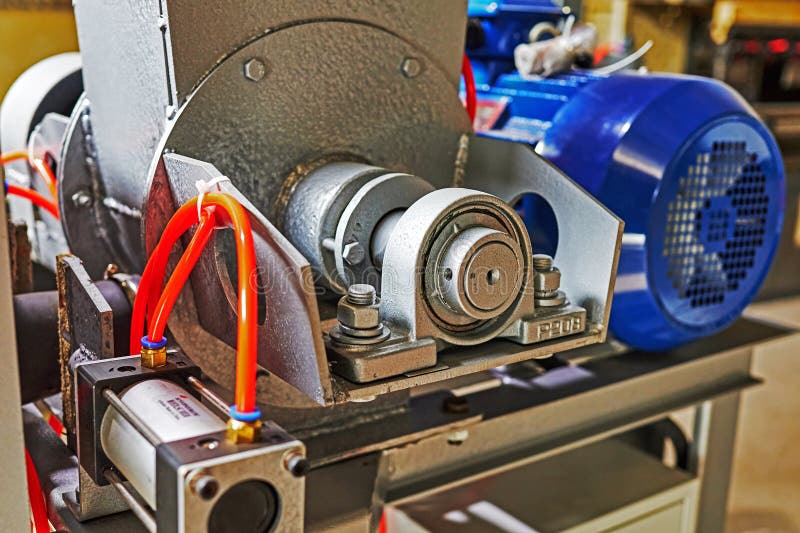 Tubes of the Pneumatic System and Shaft of Machine with Electric Motor ...