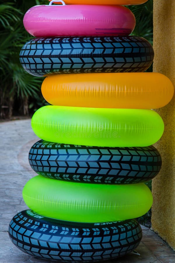 Stack Of Swimming Tubes On The Beach Stock Image - Image of leisure ...