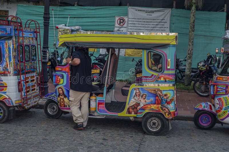 Tuck-tuck Drivers Wait for Passengers at the Main Square of Guatape ...