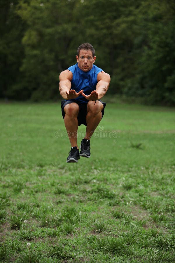 Tuck jump work out stock image. Image of field, outdoor - 32165009