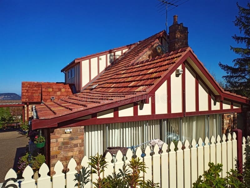 Tudor-Style House with Red Tiled Roof Stock Image - Image of villa ...