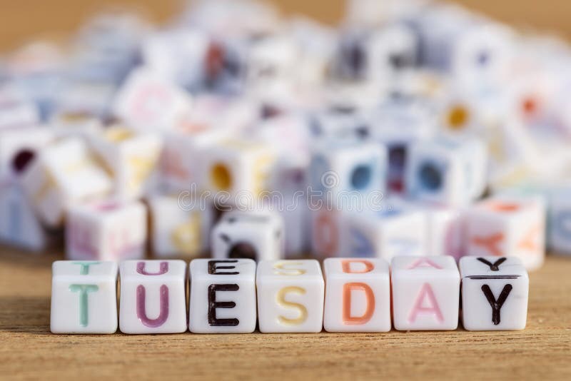 Tuesday Written in Letter Beads on Wood Background Stock Photo - Image ...