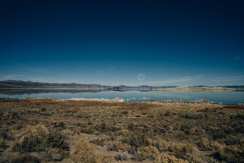 Tufa Columns Reflected in the Mirrored Water Surface at Mono Lake ...