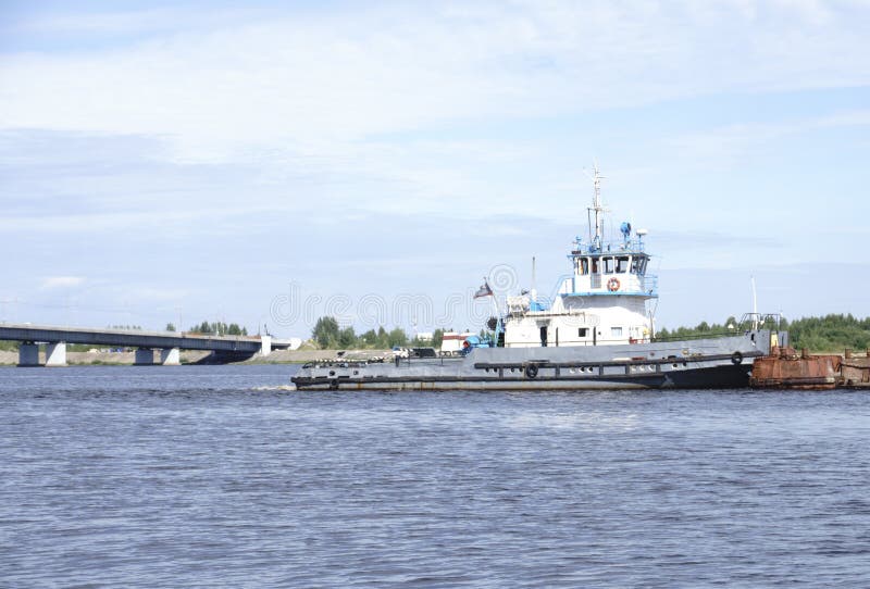 The Tug Boat Floats on the River Stock Image - Image of carrying ...