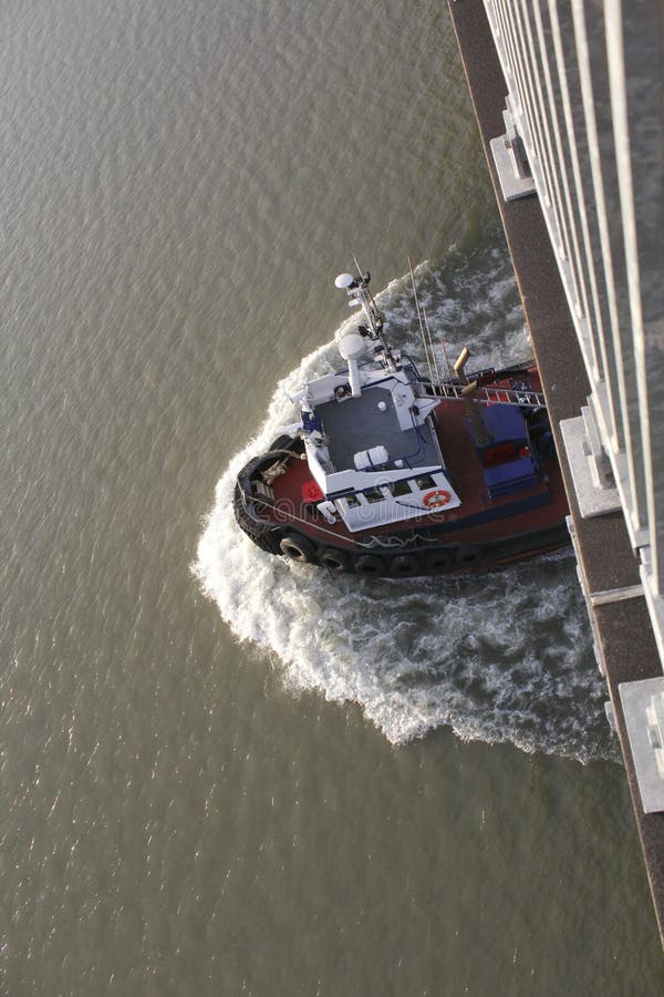 A Tug Boat Passes Beneath a Bridge Stock Image - Image of vancouver ...