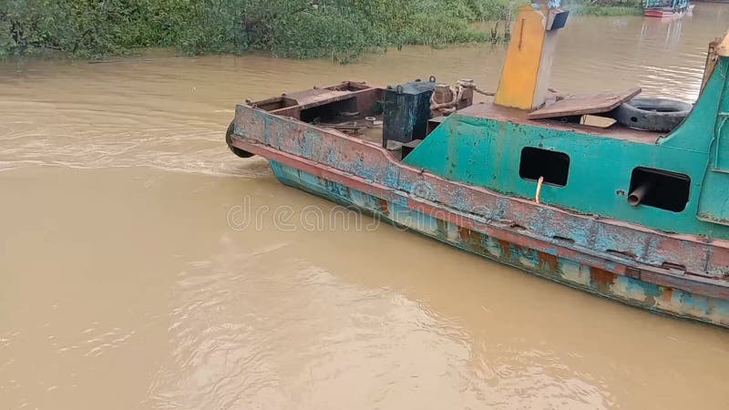 A tug boat pushing a barge stock video. Video of harbor - 256789395