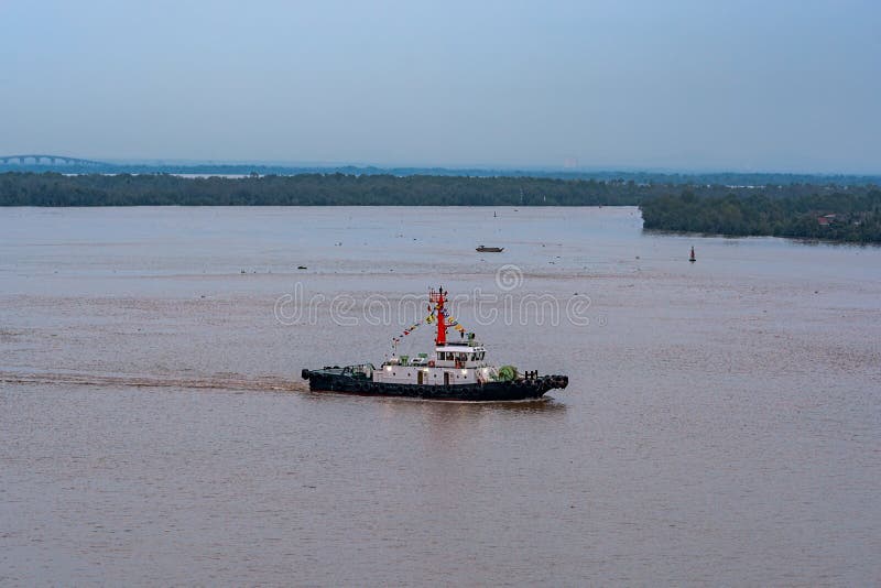 Tug boat on the river. stock image. Image of nautical - 129167131
