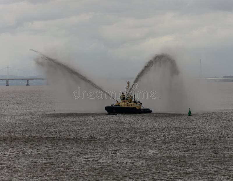 Tug Boat Tests Its Fire Hoses Stock Photo - Image of spray, water ...