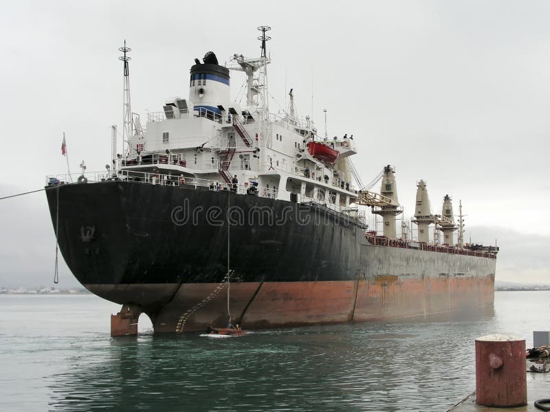 Tug Boat Towing Bulk Carrier Vessel. Stock Photo - Image of cargo, boat ...
