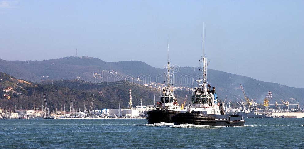 Tug boatS stock image. Image of flag, tugboat, transport - 9093315