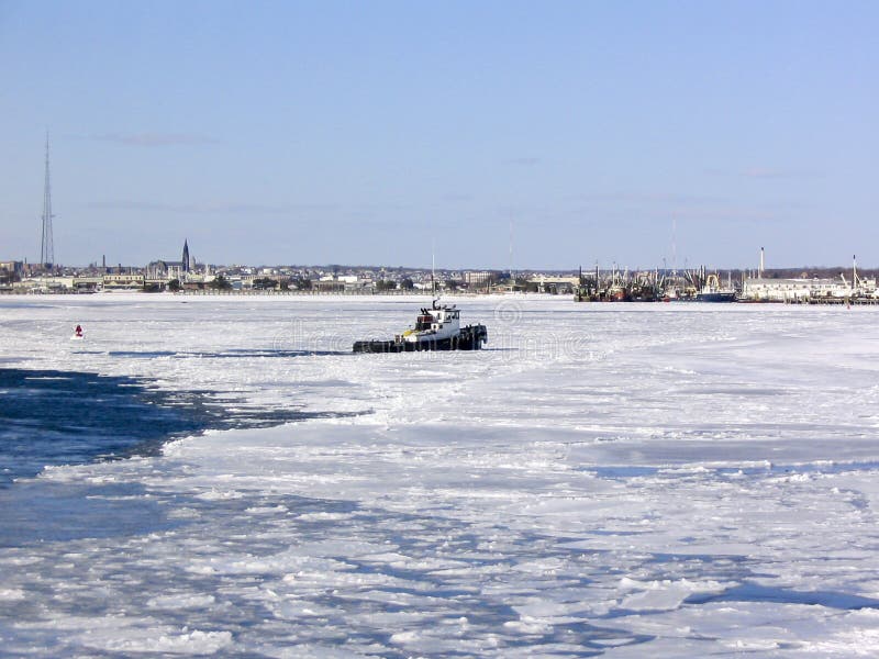 Tug in harbor ice stock image. Image of boat, fairhaven - 100371793