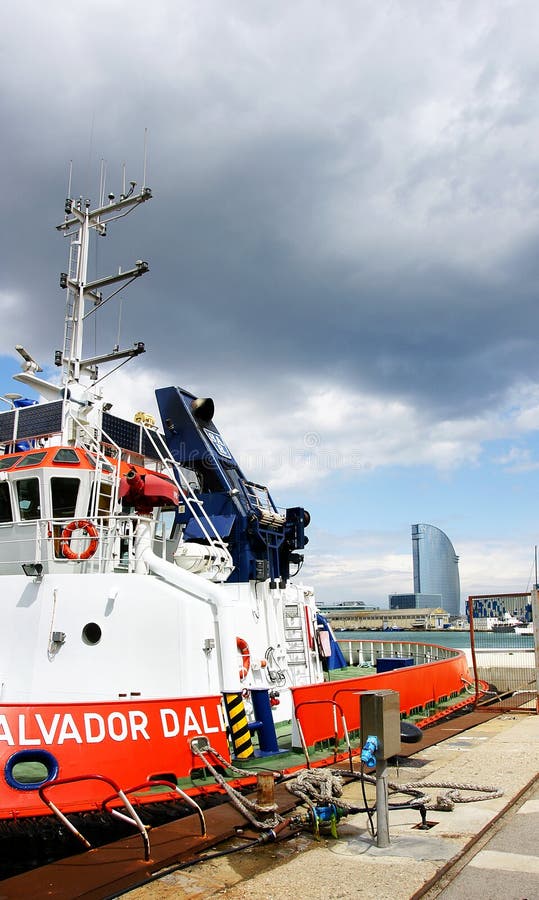 Tug moored at a pier editorial stock image. Image of building - 43944209