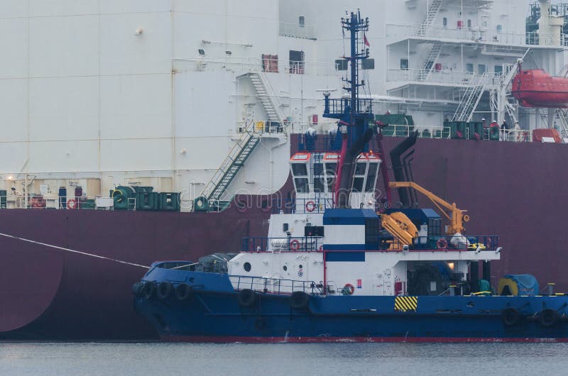 Tug at the Stern of Lng Carrier Stock Photo - Image of industry ...