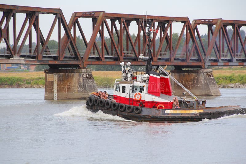 Tug and Train Bridge stock photo. Image of side, land - 55577906