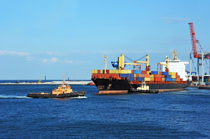 Tugboat Assisting Container Cargo Ship Stock Photo - Image of odessa ...