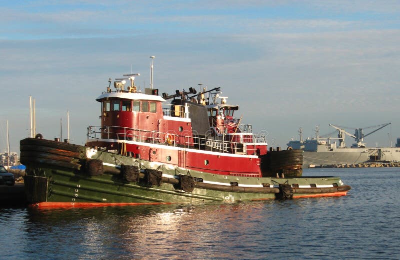 Tugboat in Harbor stock photo. Image of sunlight, freight - 12879990
