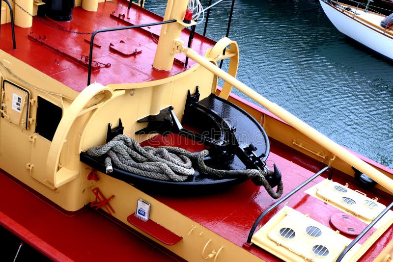 Tugboat pulling freighter stock image. Image of containers - 9894621